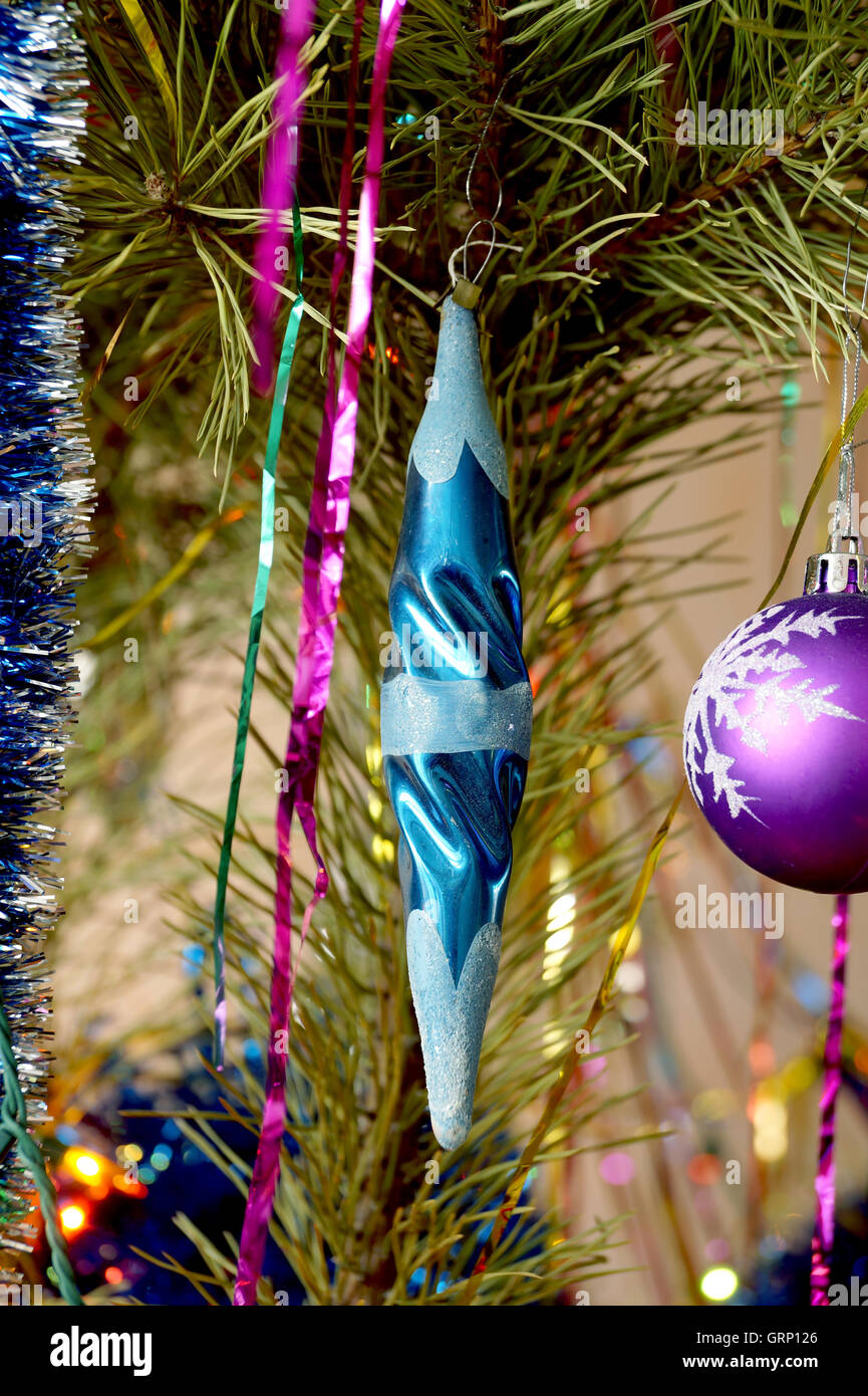Fir-tree toy an icicle on a fir-tree Stock Photo - Alamy