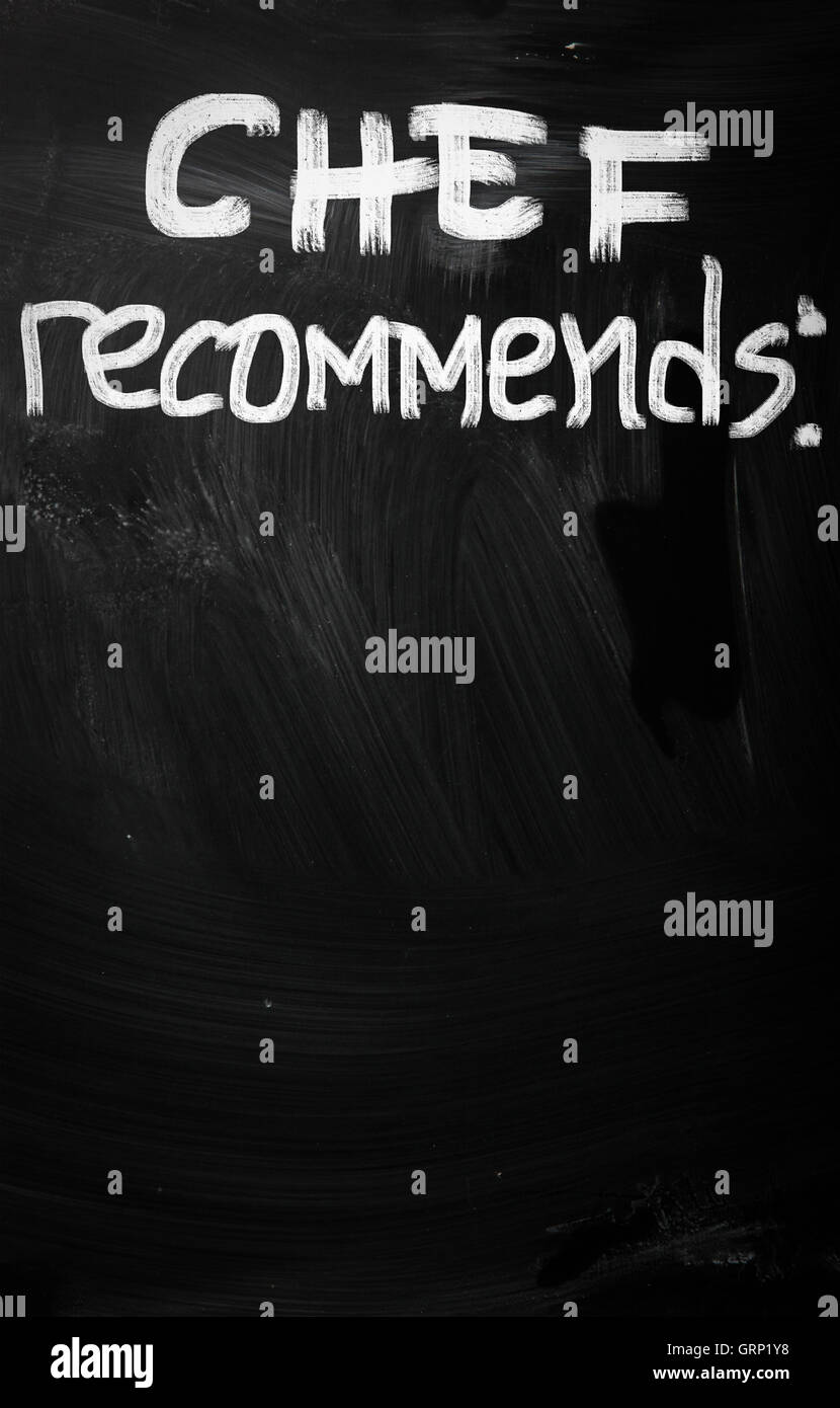 Chef recommends handwritten with white chalk on a blackboard Stock ...