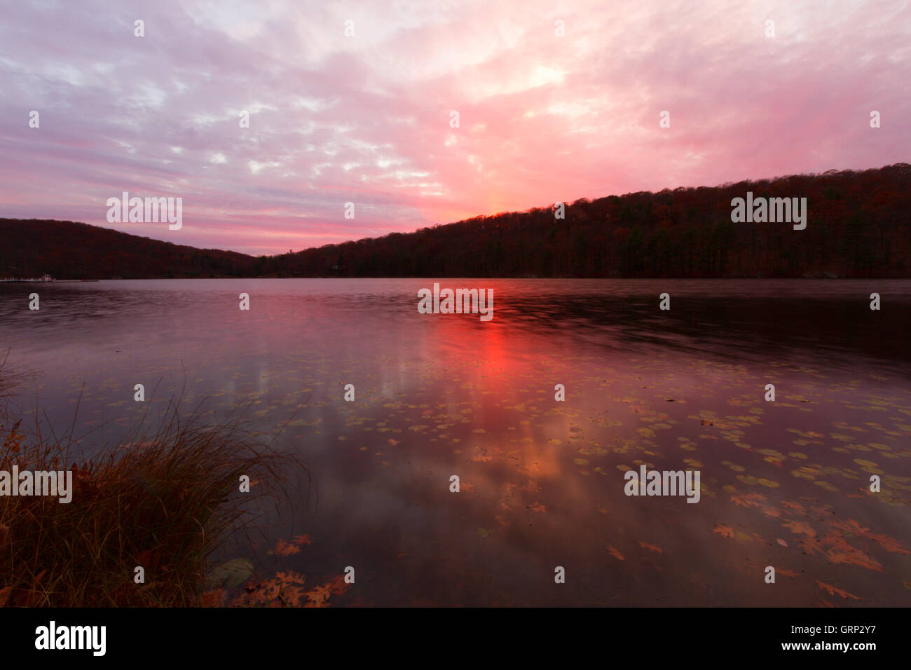 Fall landscape with the forest lake at sunset Stock Photo - Alamy