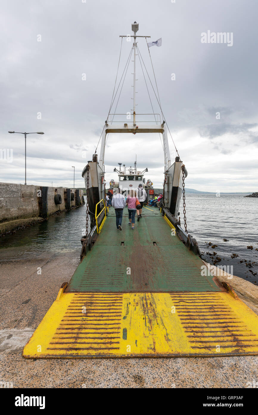 Passengers embarking in Canna ferry Rathlin Island, Northern Ireland ...