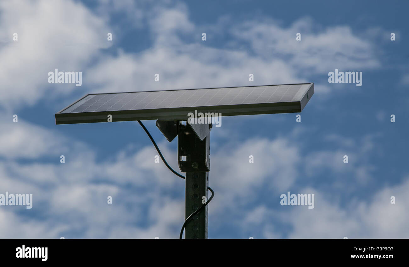A small solar panel on a bearing of a street speed radar Stock Photo ...