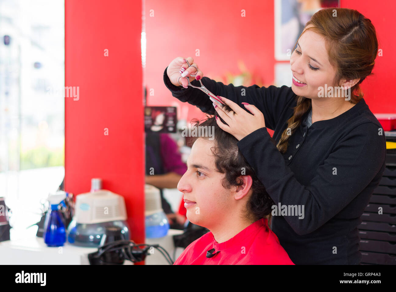 Hair between fingers is the technique used on a barber shops, scissors ...