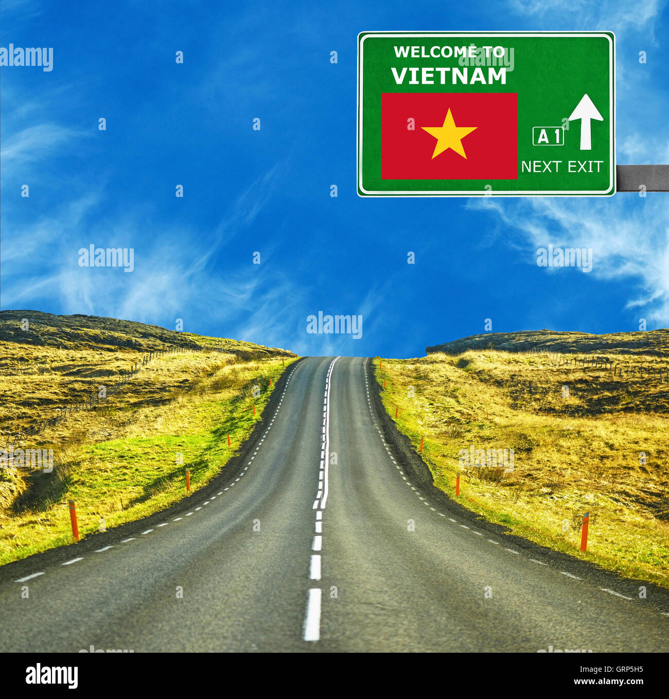 Vietnam road sign against clear blue sky Stock Photo - Alamy
