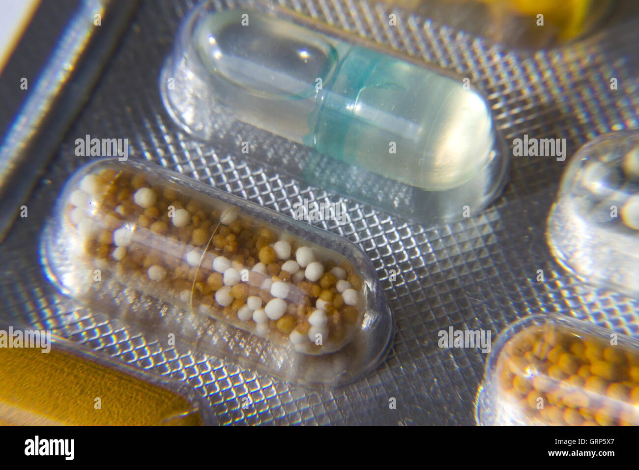 Detail of various colorful pills in transparent medicine capsule Stock ...