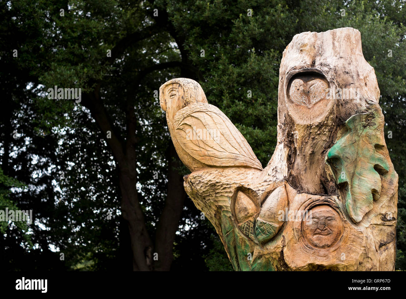 A wood carving created from a dead tree in the grounds of Castle Ashby ...