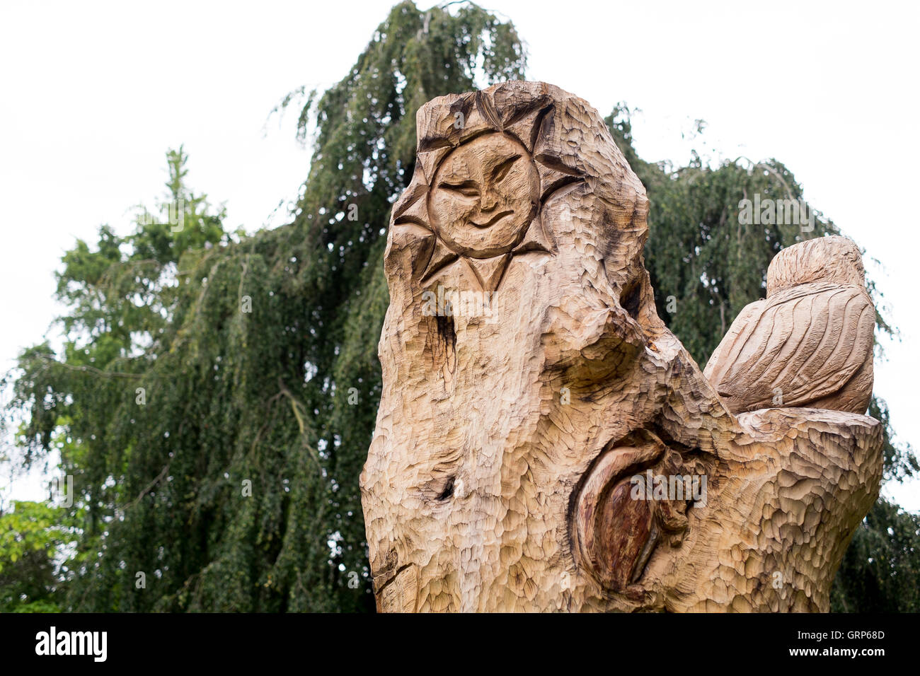 Sun carved in wood hi-res stock photography and images - Alamy