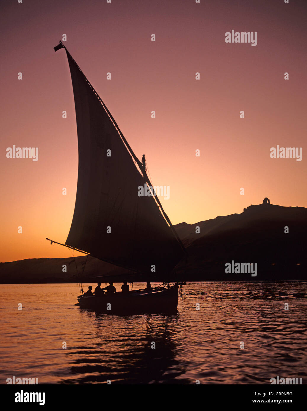 Felucca on the Nile at sunset, Aswan, Upper Egypt Stock Photo - Alamy