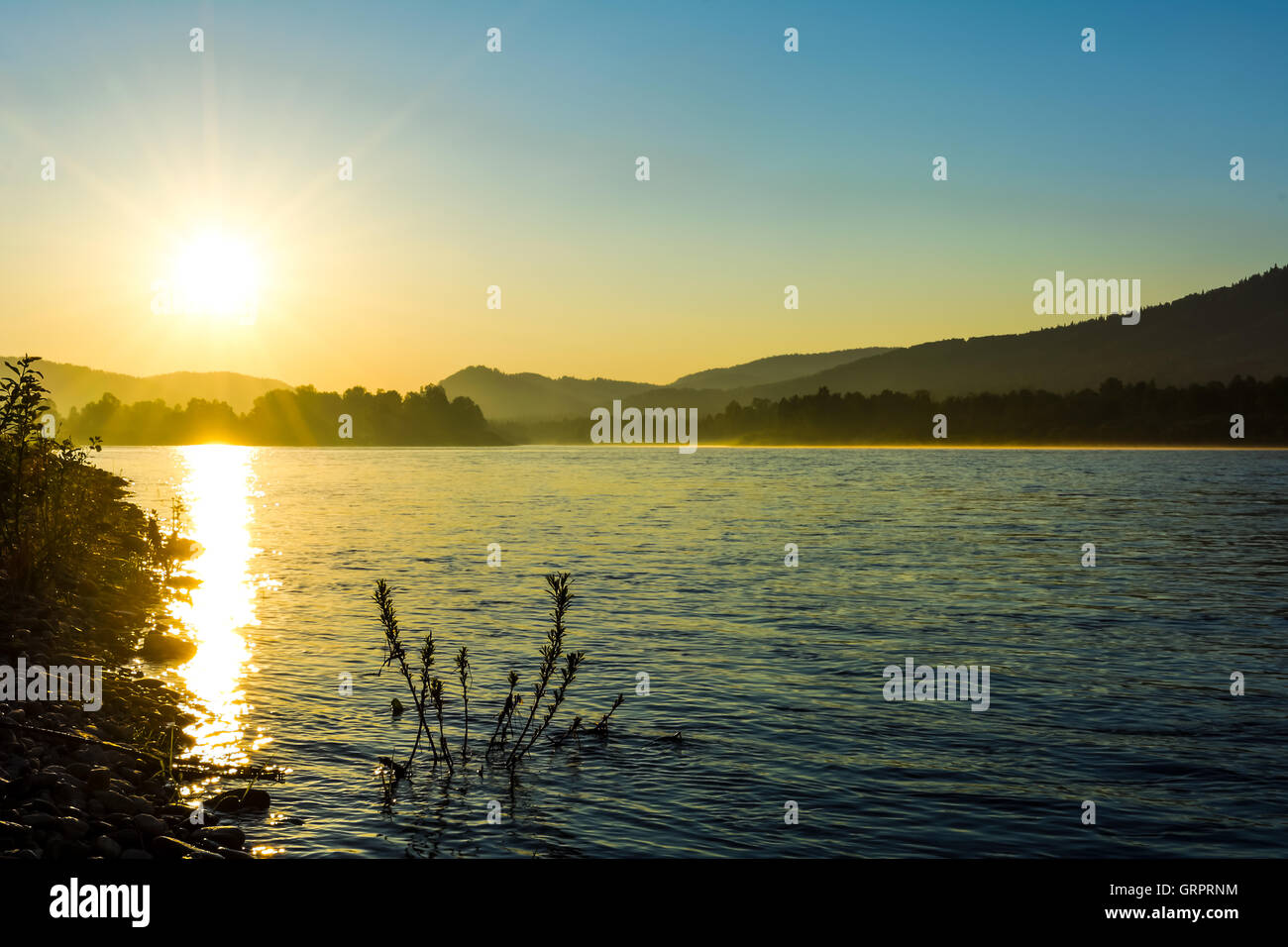 Summer sunrise over idyllic river landscape. Lake landscape. Beautiful ...