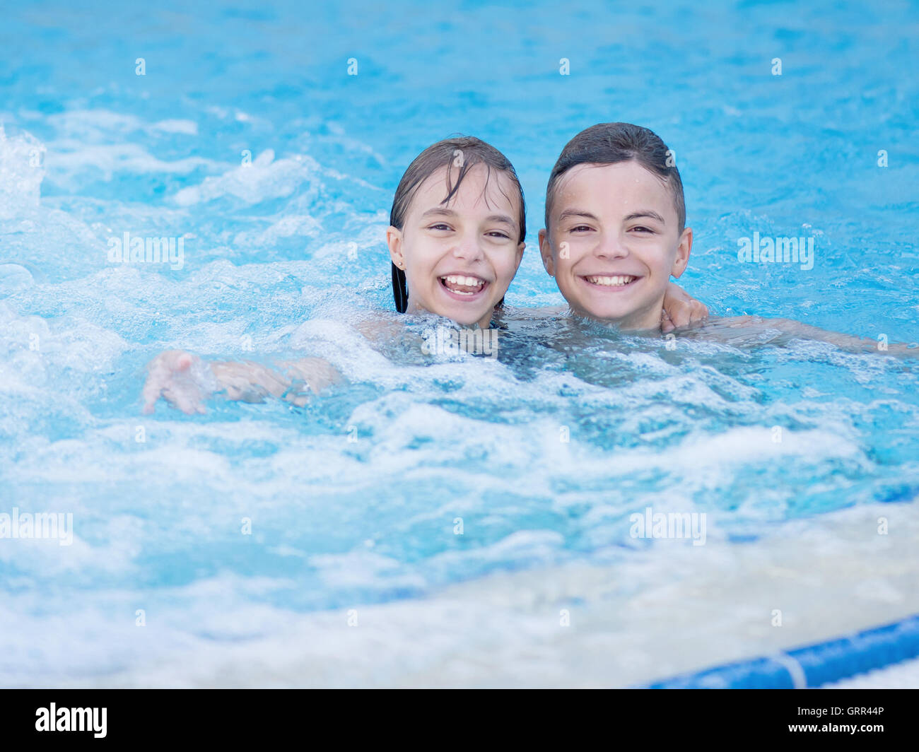 Children in pool Stock Photo - Alamy