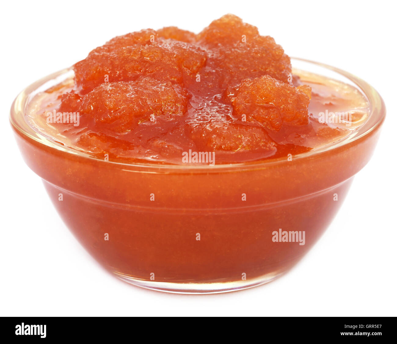 Molasses in a glass bowl over white background Stock Photo - Alamy