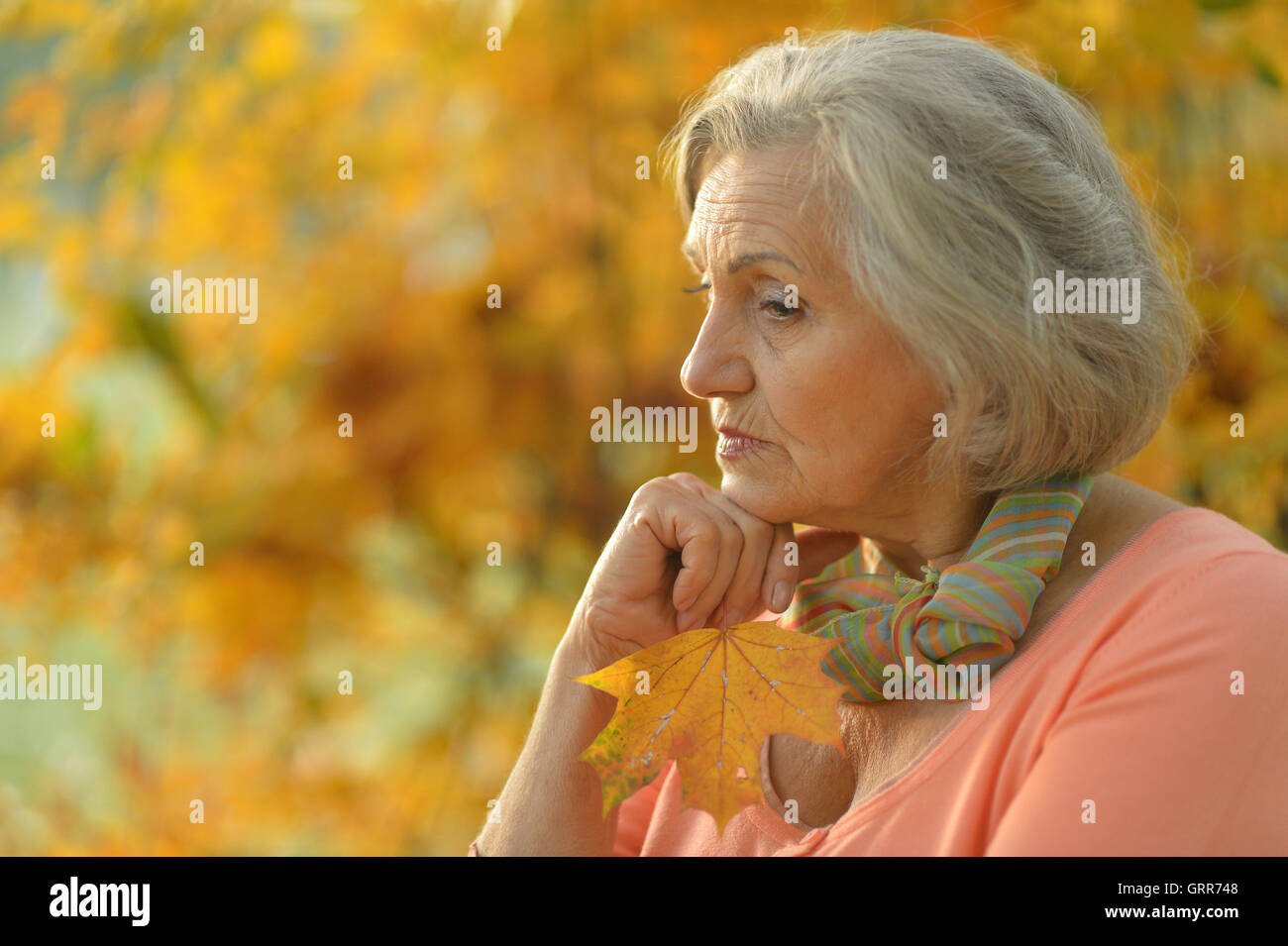 Nice sad old woman Stock Photo - Alamy