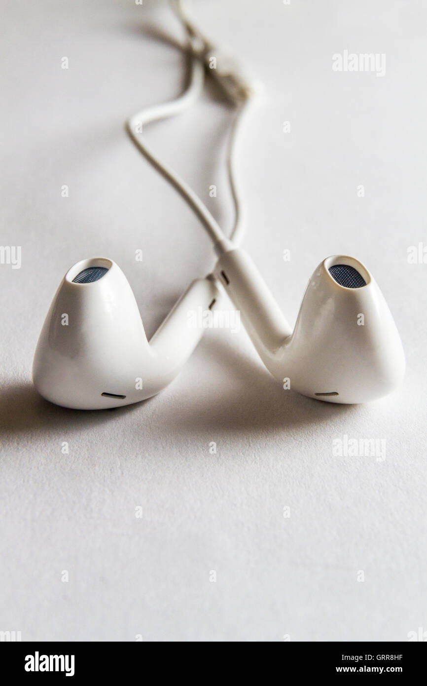 A set of Apple earbuds from the iphone 6 now obsolete with the ...