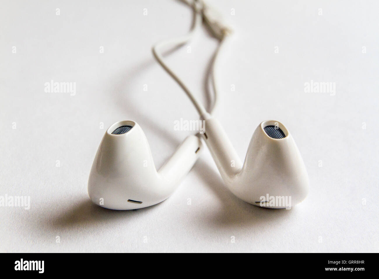 A set of Apple earbuds from the iphone 6 now obsolete with the ...
