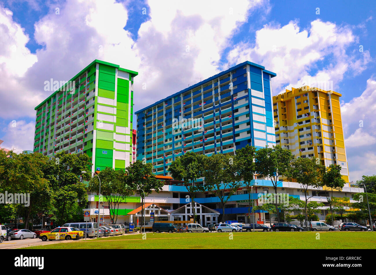 Bugis, Singapore - July 23, 2013: Three colorful apartment buildings in ...
