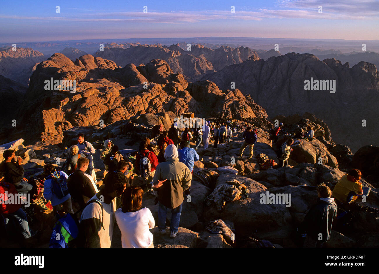 Pilgrims and tourists on the summit of Mount Sinai at dawn, Egypt Stock ...