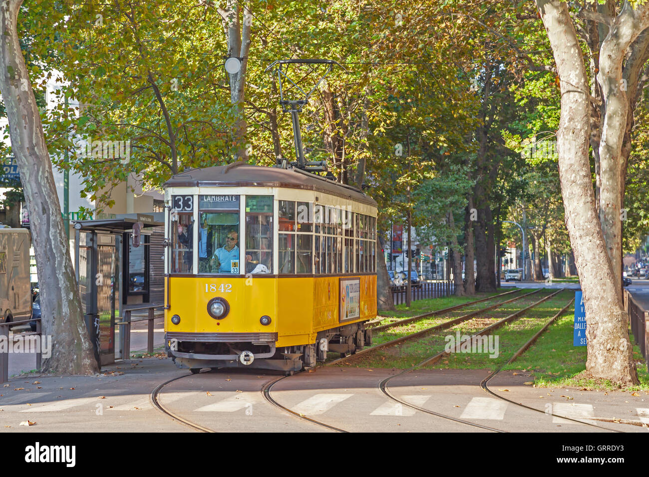 Old Yellow tram on the street of Milan Stock Photo - Alamy