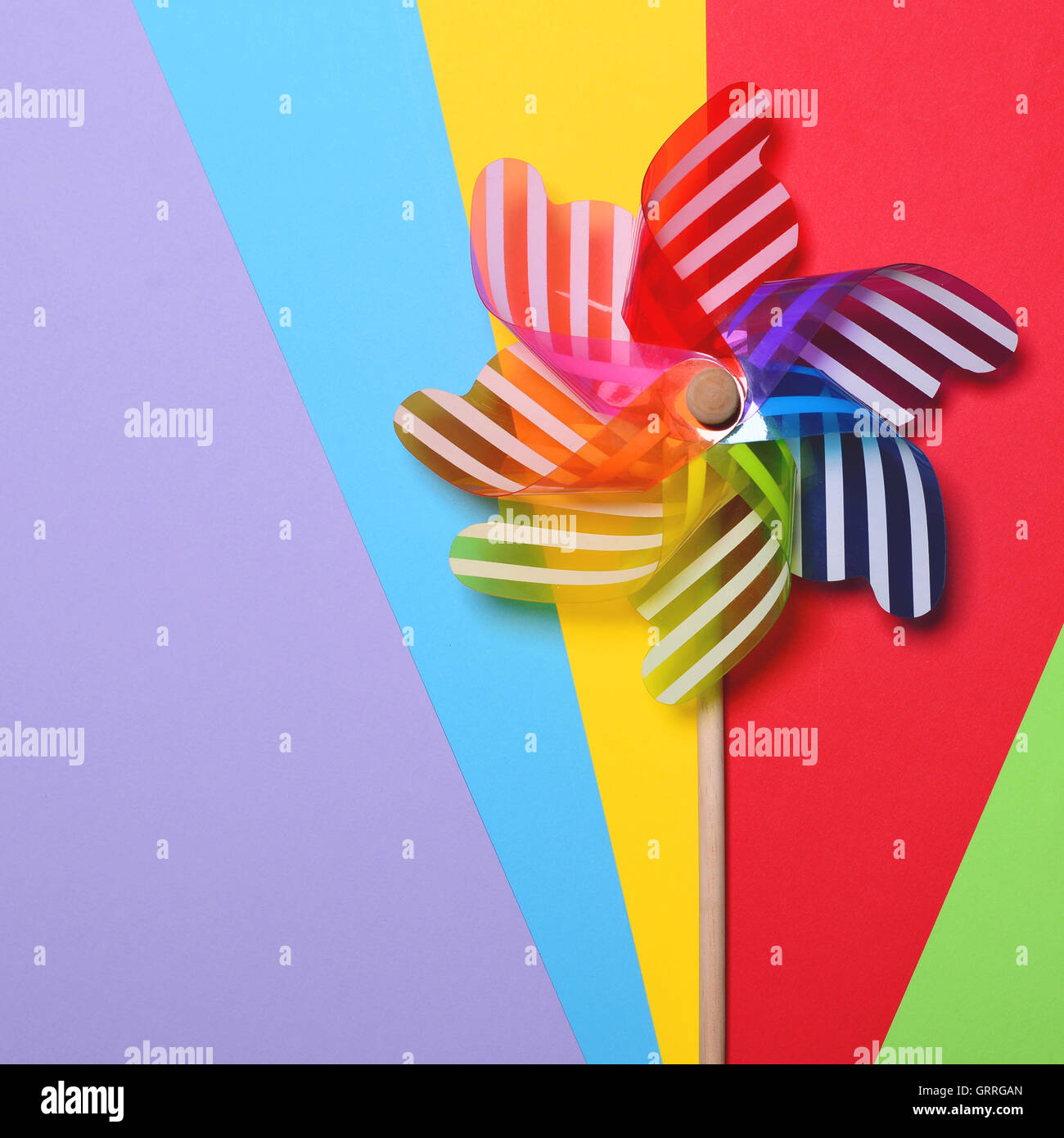 Multicolored pinwheel on colorul backgrounds - Minimal design Stock ...