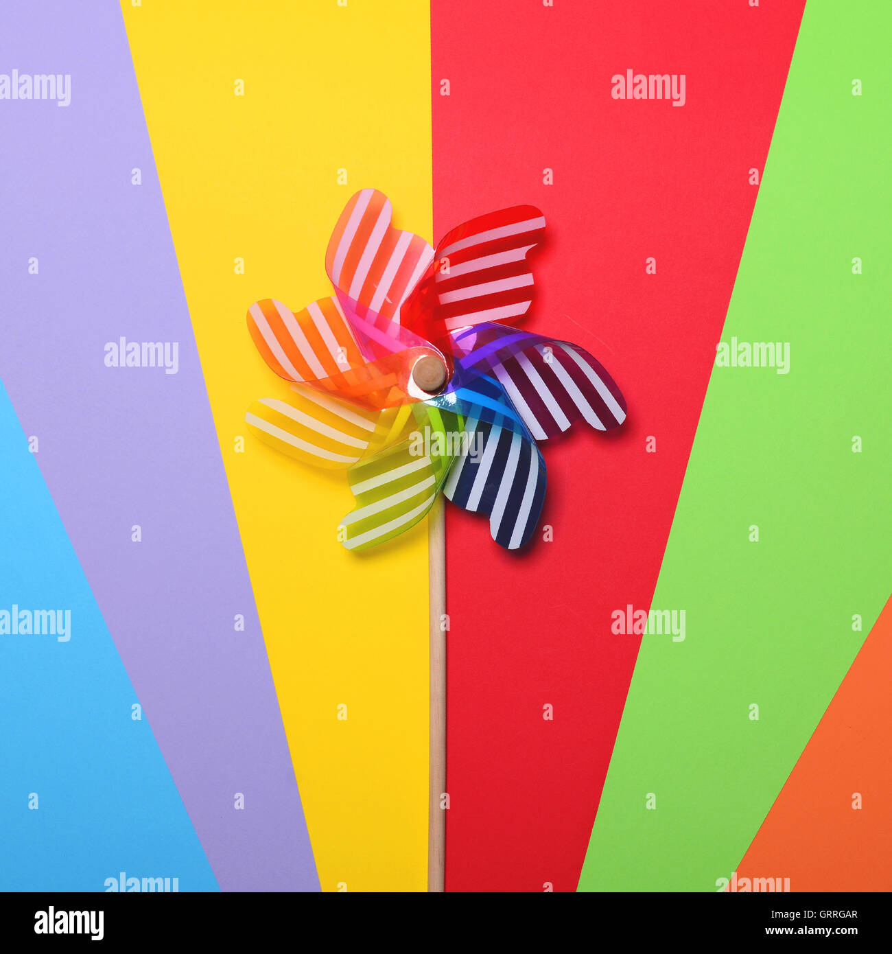 Multicolored pinwheel on colorul backgrounds - Minimal design Stock ...