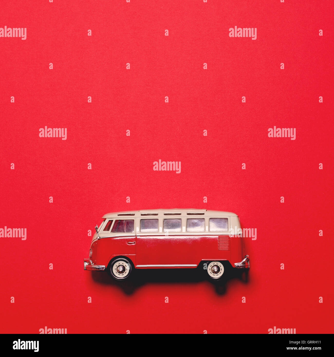 Retro bus on red background - Minimal design Stock Photo - Alamy