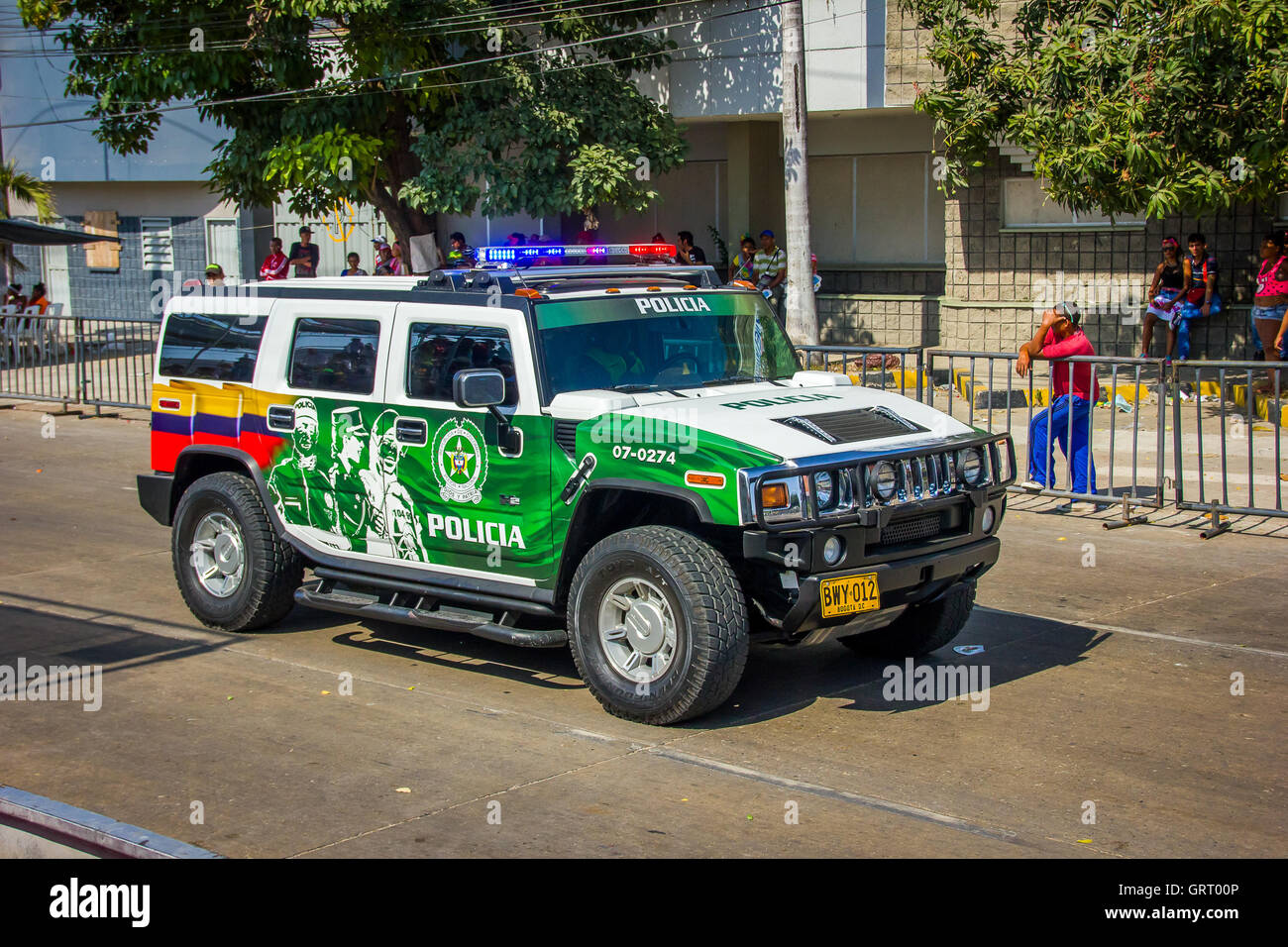 Police cars patrolling streets just before Colombia's most impor Stock ...