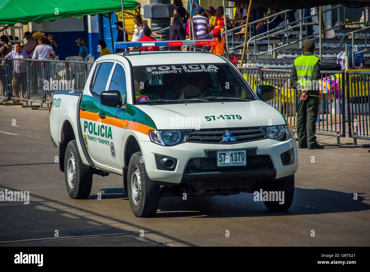 Police cars patrolling streets just before Colombia's most impor Stock ...