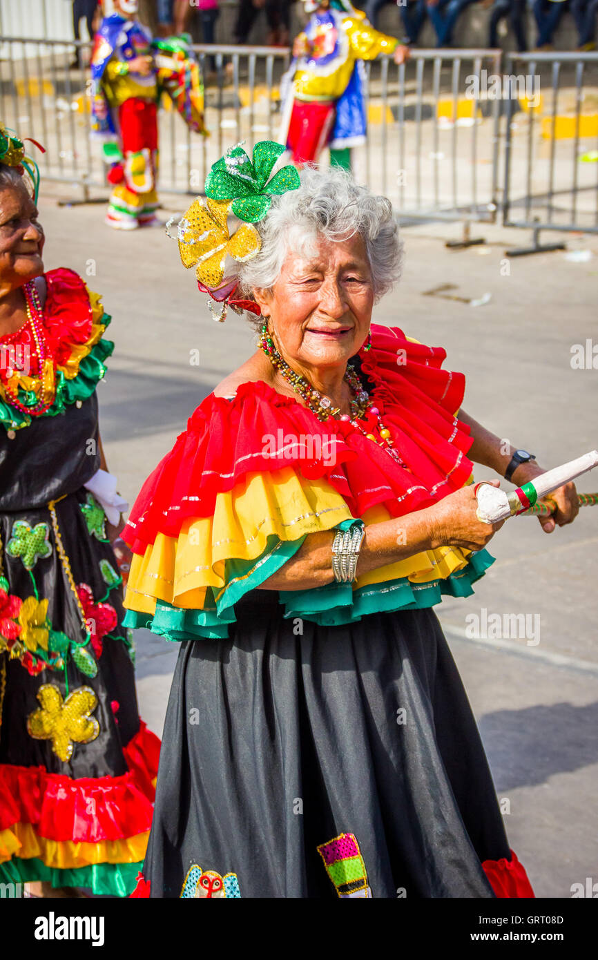 Performers with colorful and elaborate costumes participate in C Stock ...