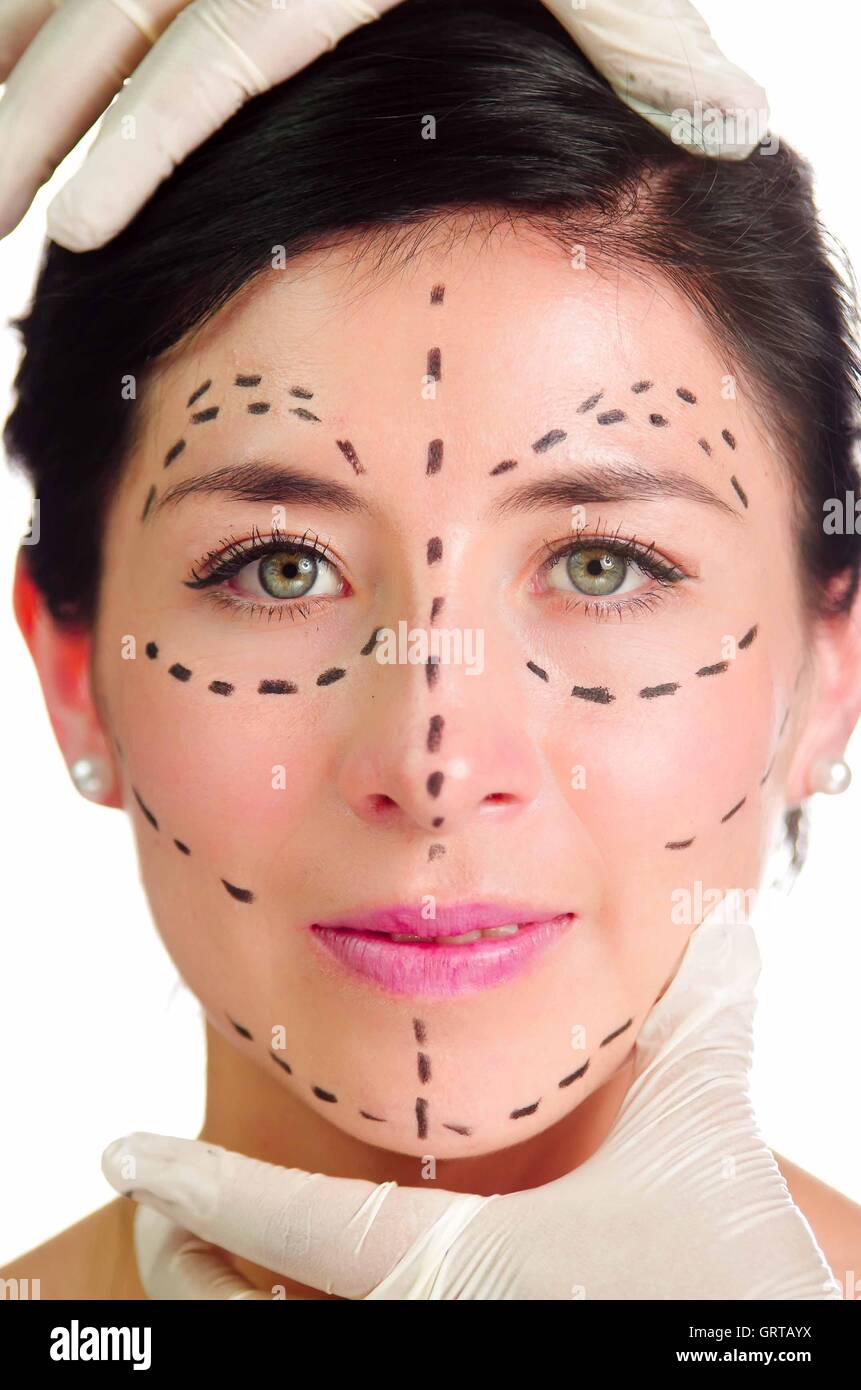 Headshot caucasian woman with dotted lines drawn around face looking ...