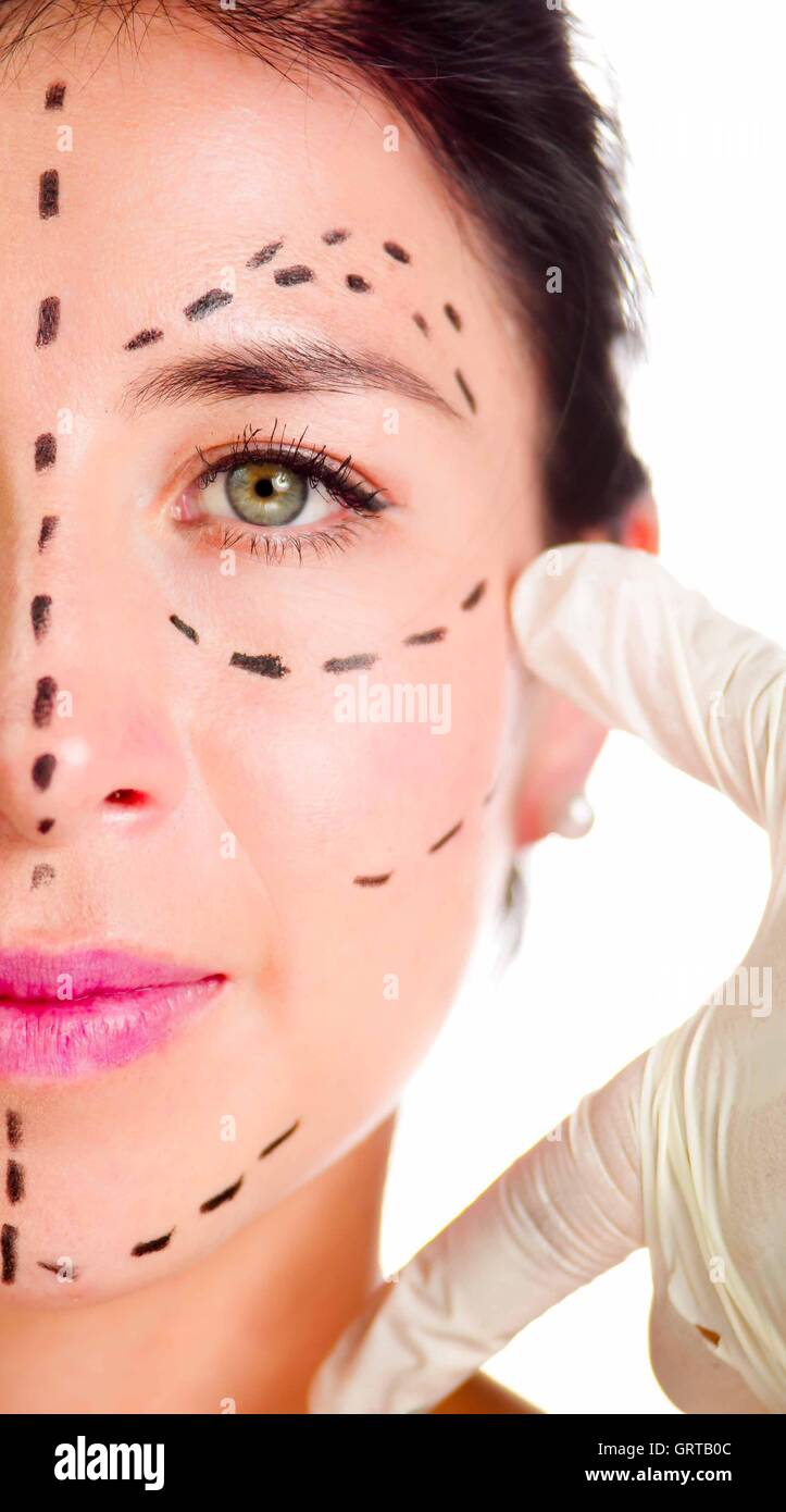 Closeup half of face caucasian woman with dotted lines drawn around ...