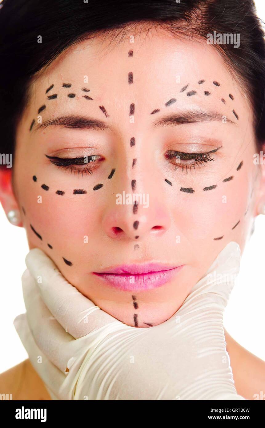 Headshot caucasian woman with dotted lines drawn around face looking ...