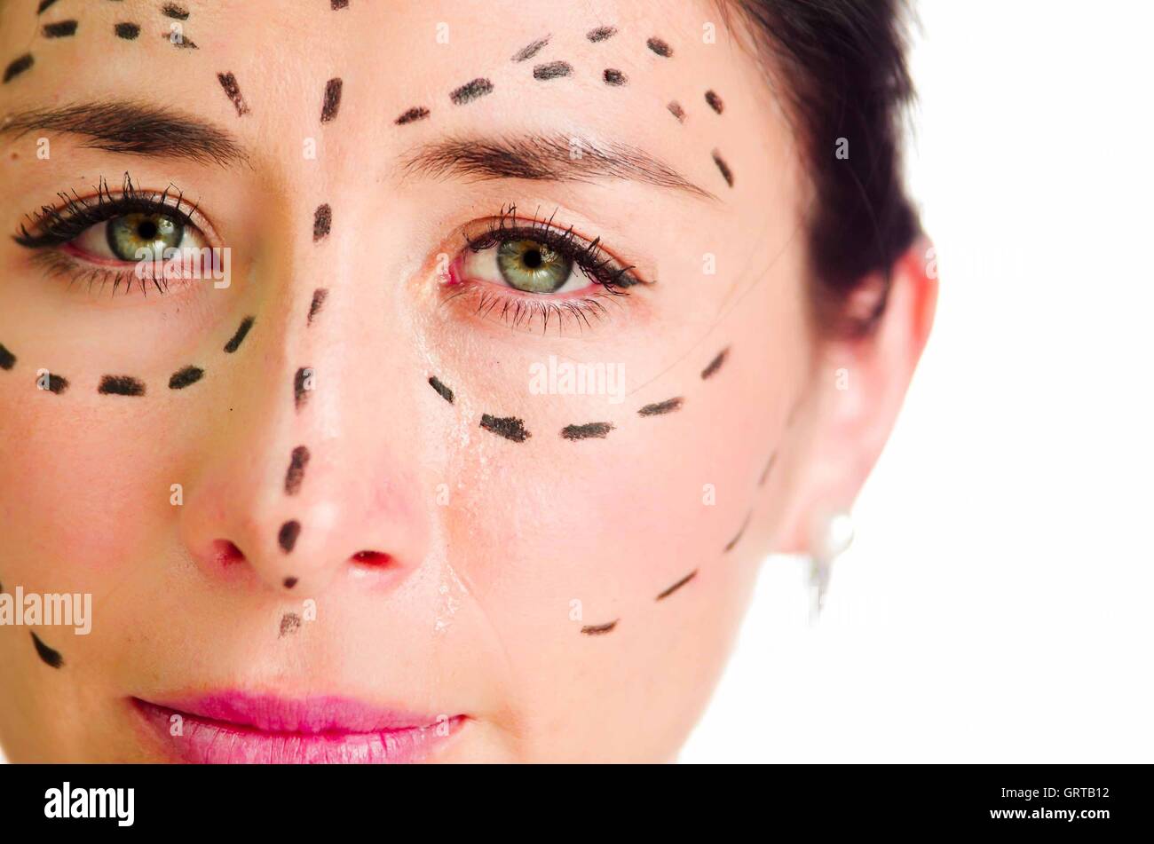 Closeup headshot caucasian woman with dotted lines drawn around face ...