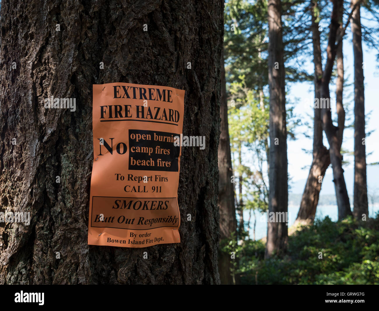 A posted notice of "Extreme Fire Hazard" due to extended dry weather, Bowen Island, B.C., August ...