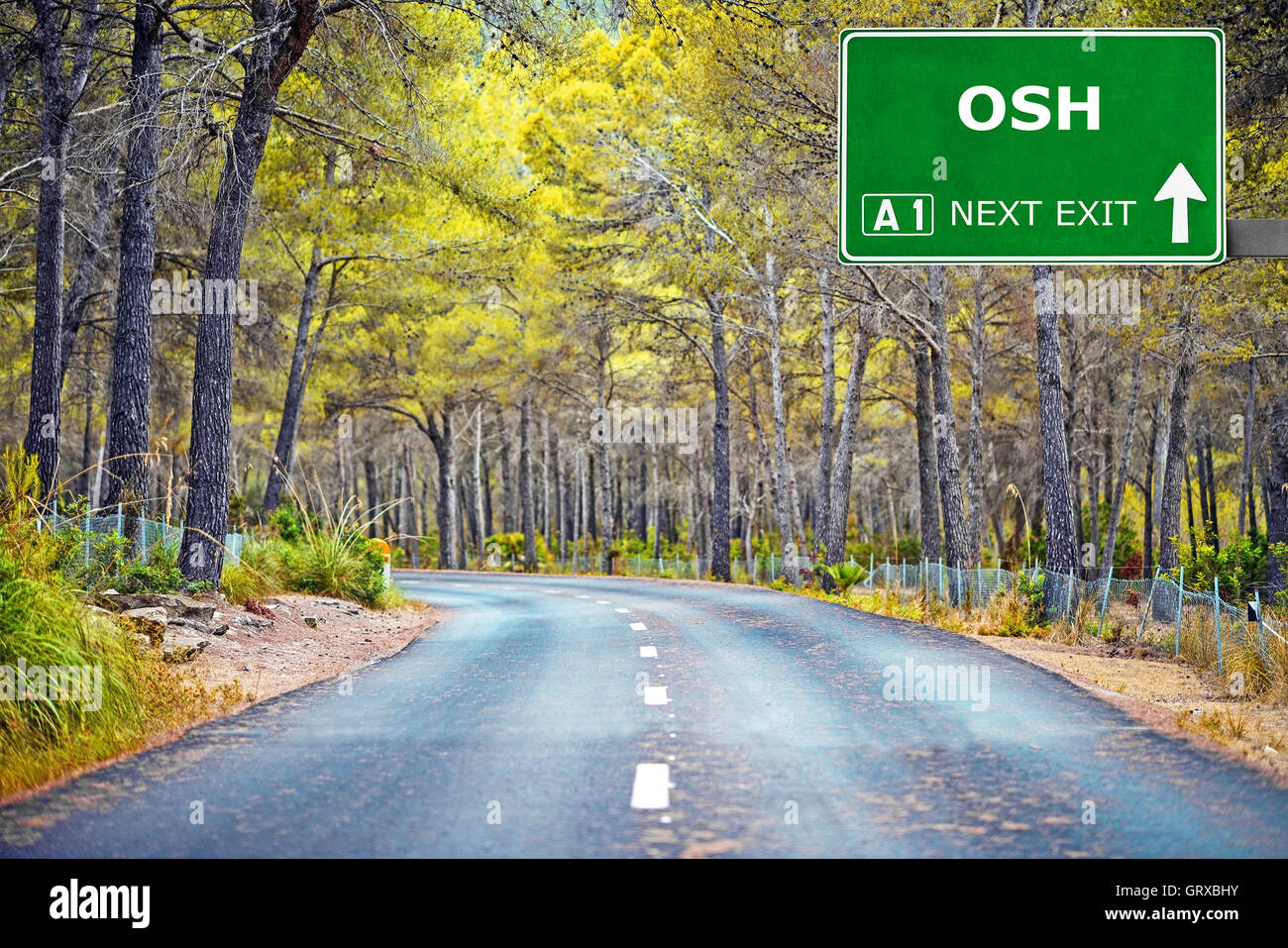OSH road sign against clear blue sky Stock Photo - Alamy