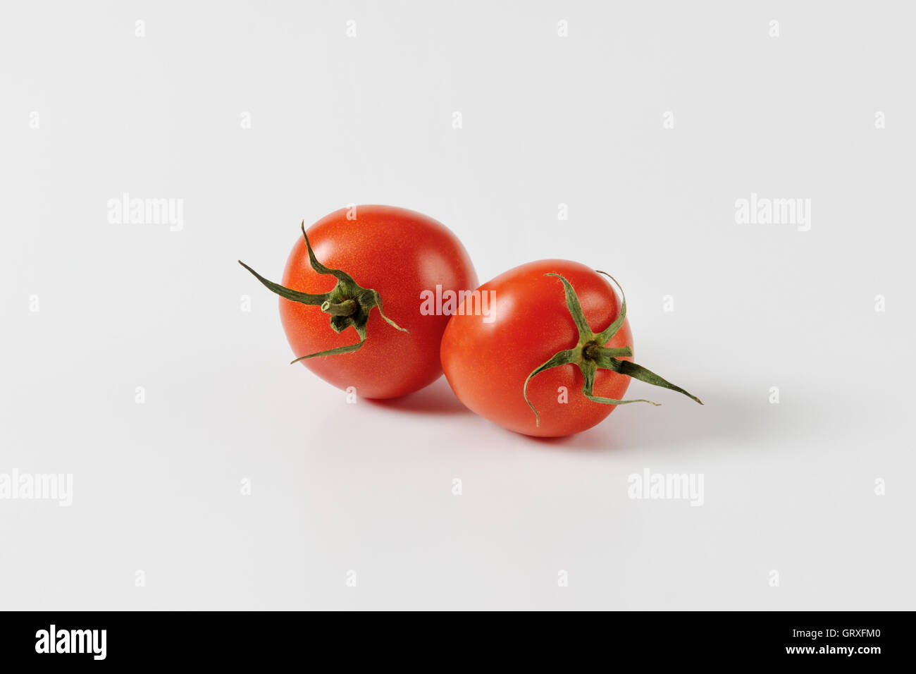 Two red tomatoes hi-res stock photography and images - Alamy
