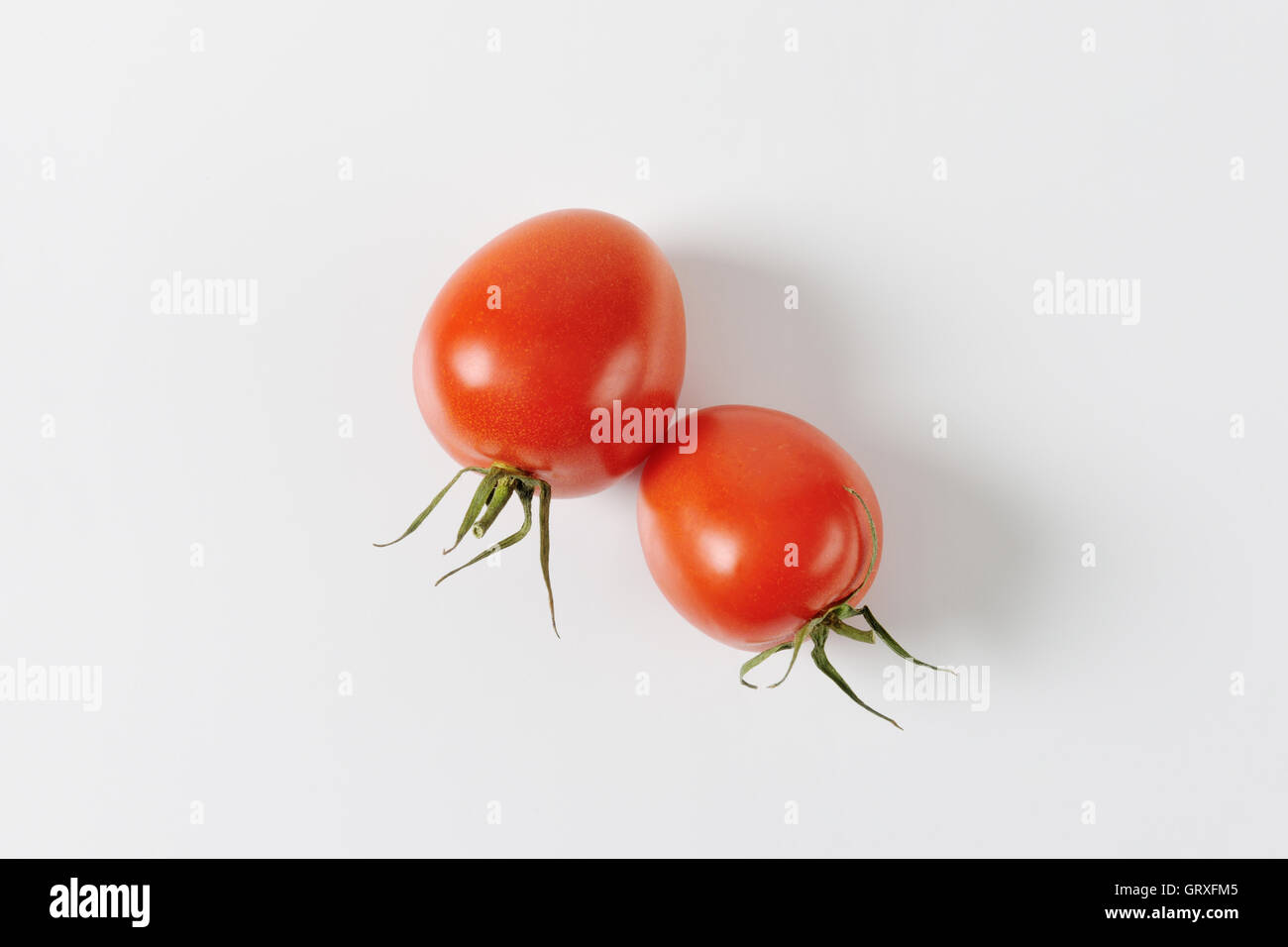 Two red tomatoes hi-res stock photography and images - Alamy