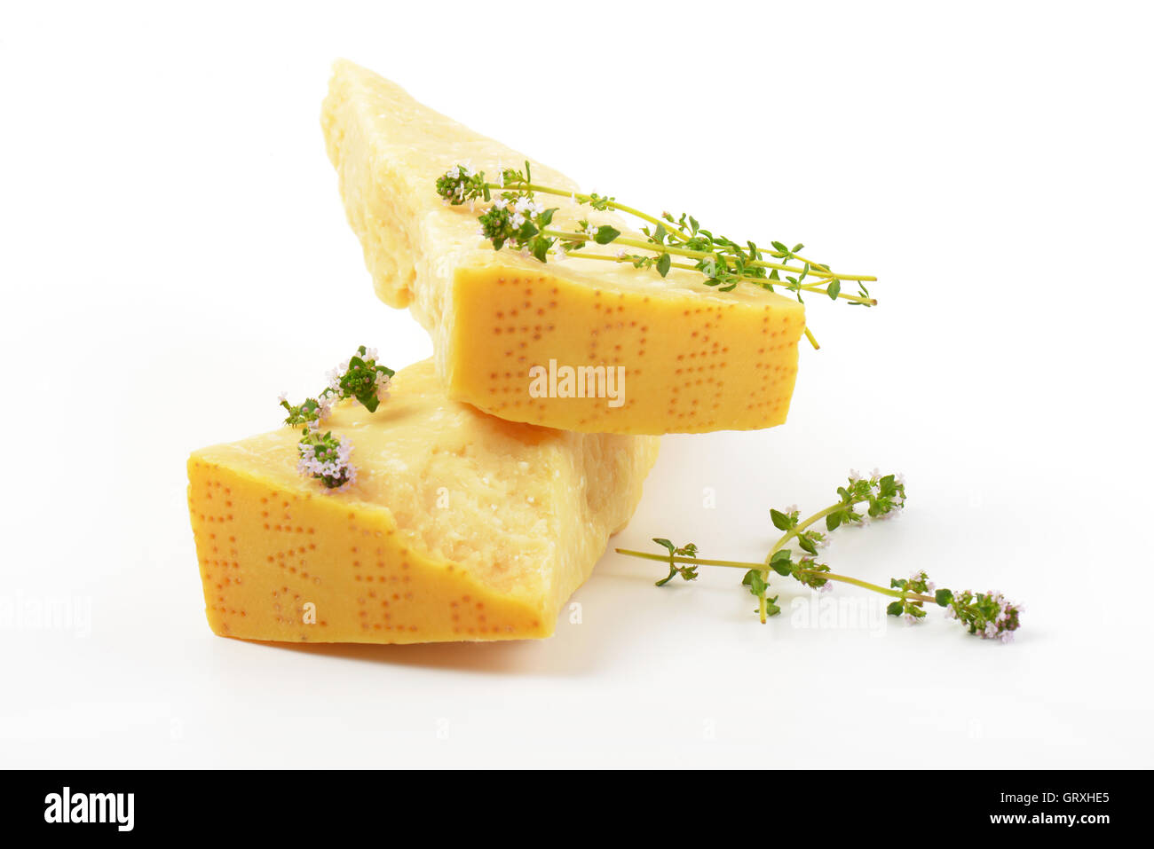 Two wedges of true Parmesan cheese Stock Photo - Alamy