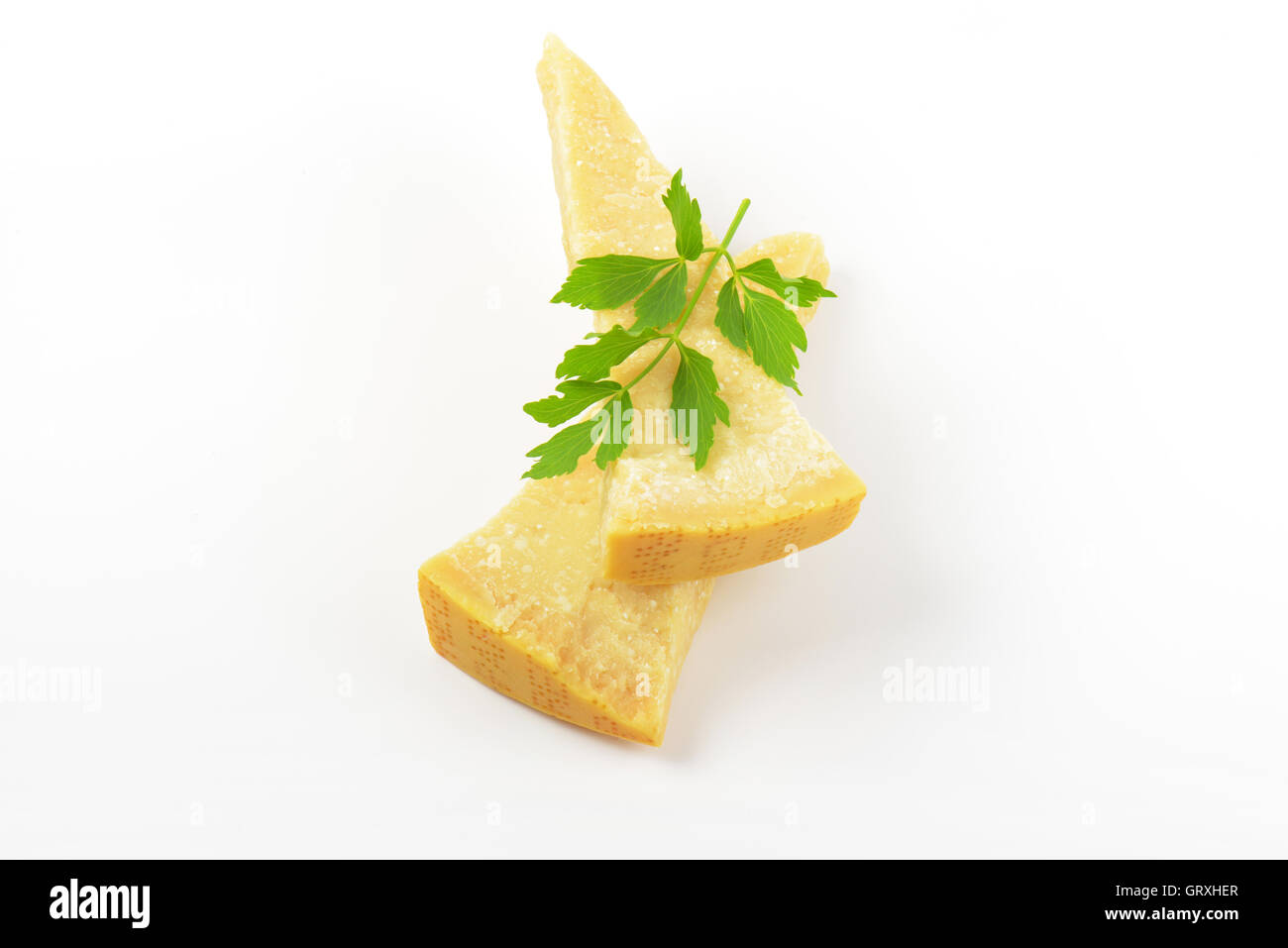 Two wedges of true Parmesan cheese Stock Photo - Alamy