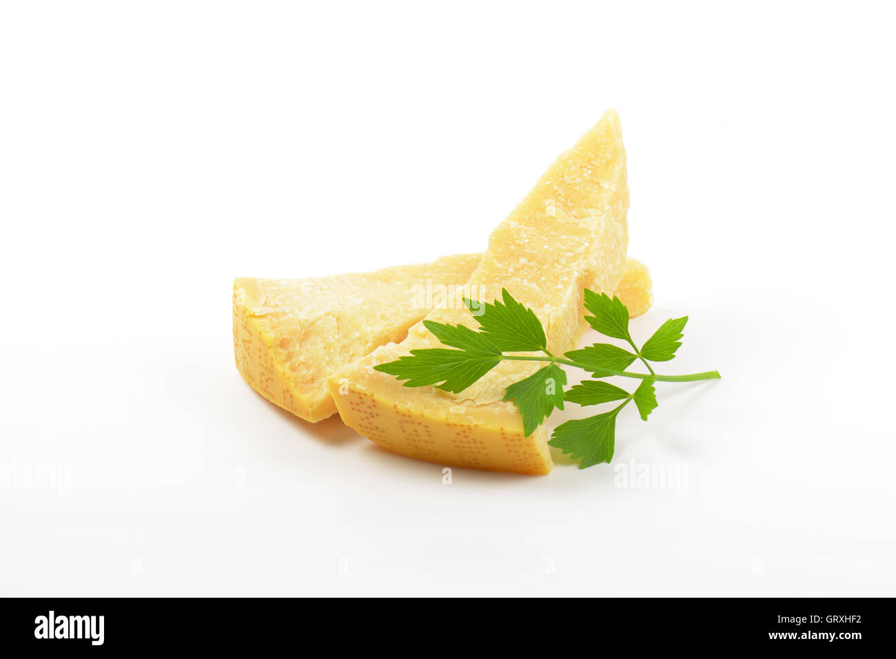 Two wedges of true Parmesan cheese Stock Photo - Alamy