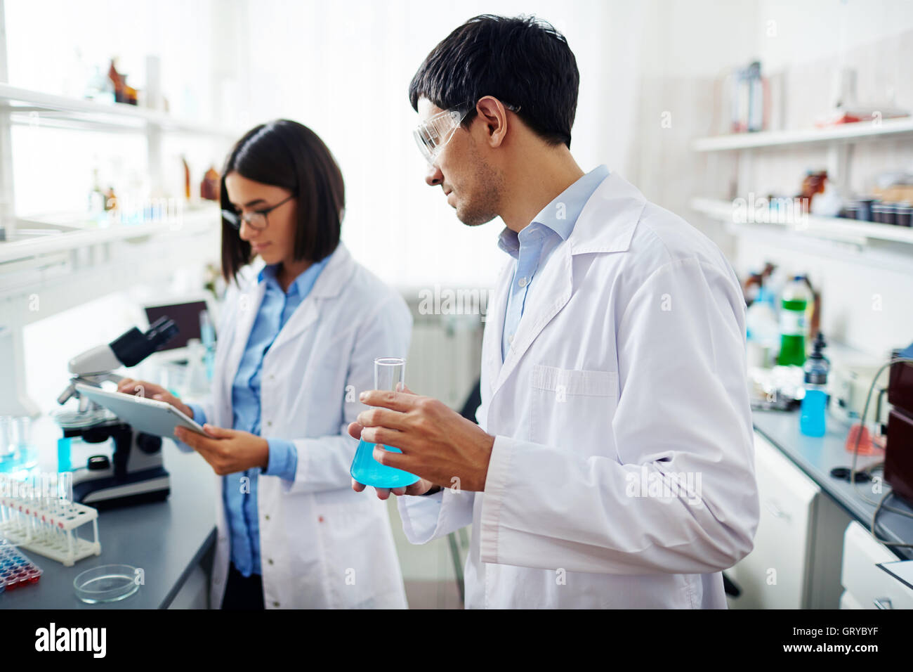Scientists at work Stock Photo - Alamy
