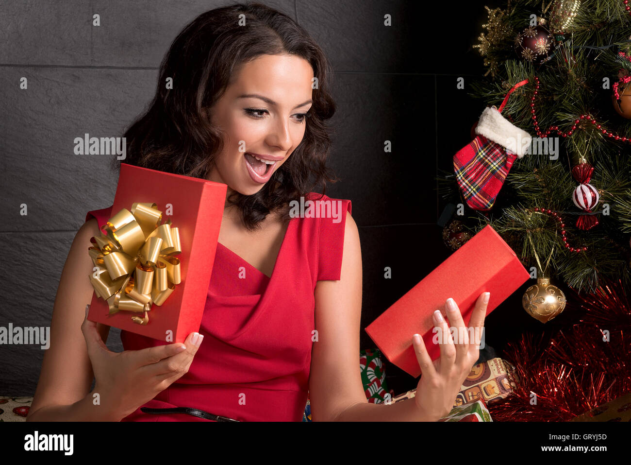 Women opening gift box hi-res stock photography and images - Alamy