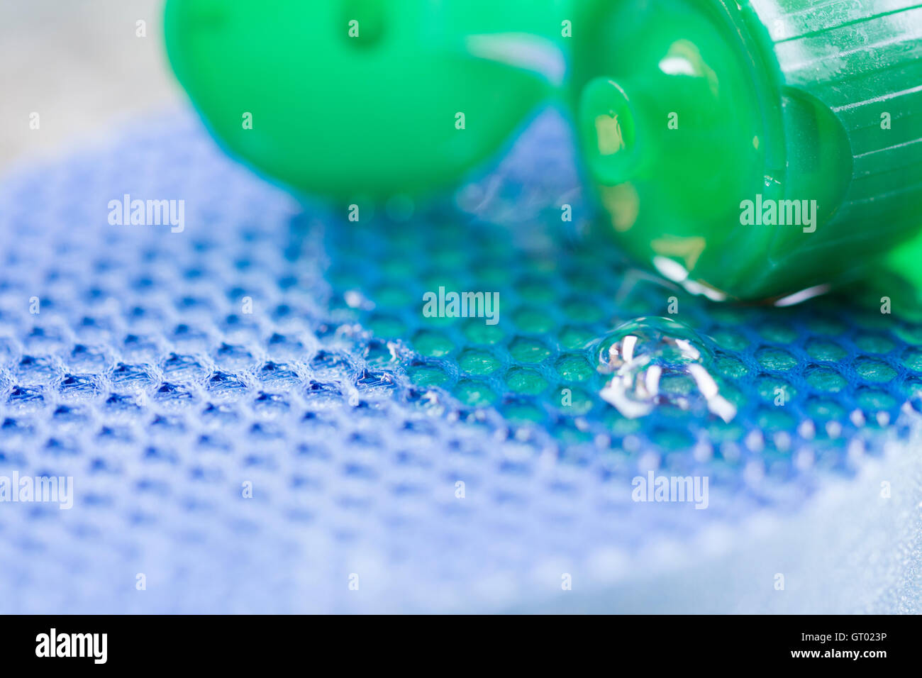 detail of dishwashing liquid and sponge Stock Photo - Alamy