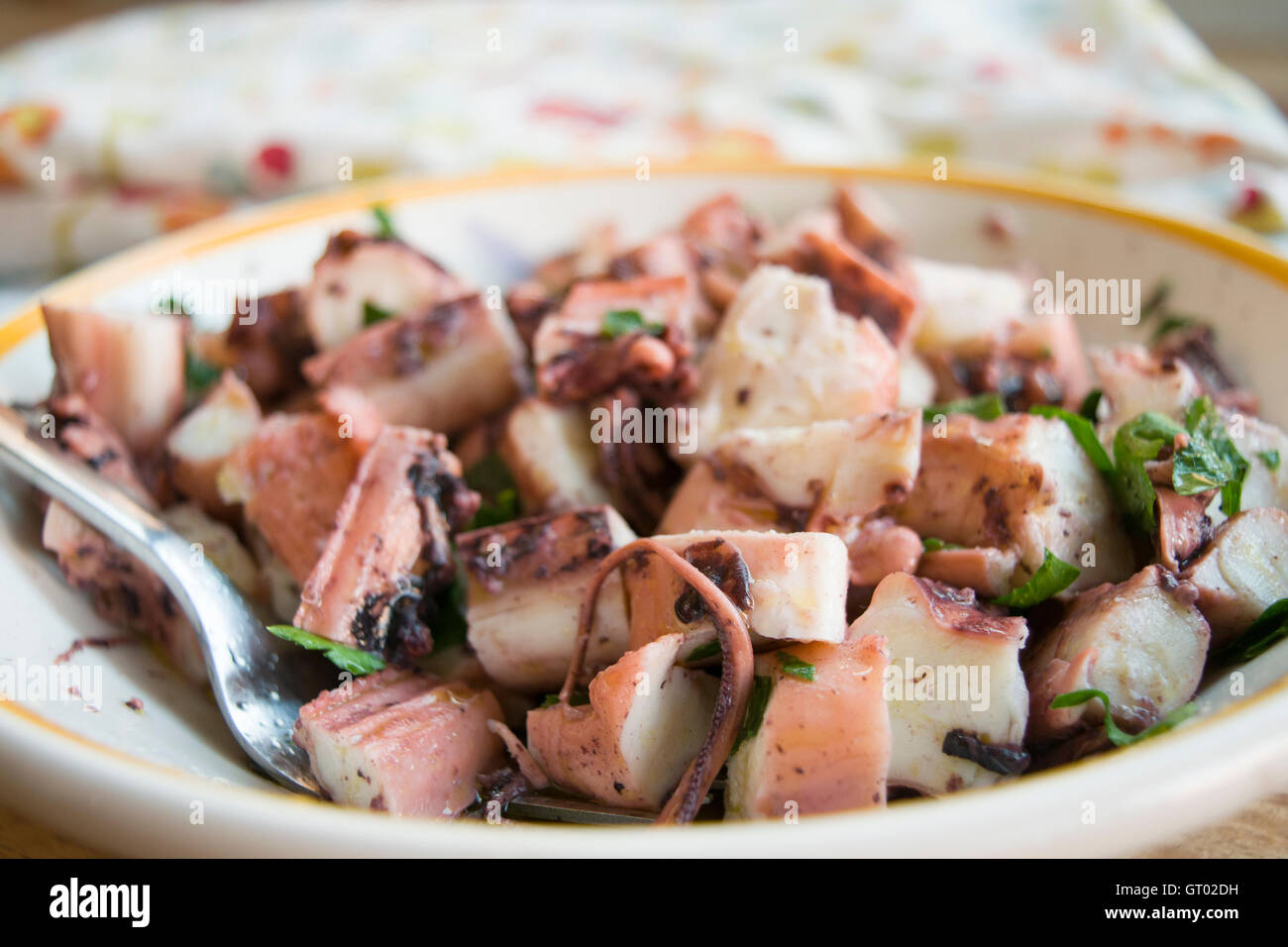 summer and cold octopus salad with oil and lemon Stock Photo - Alamy