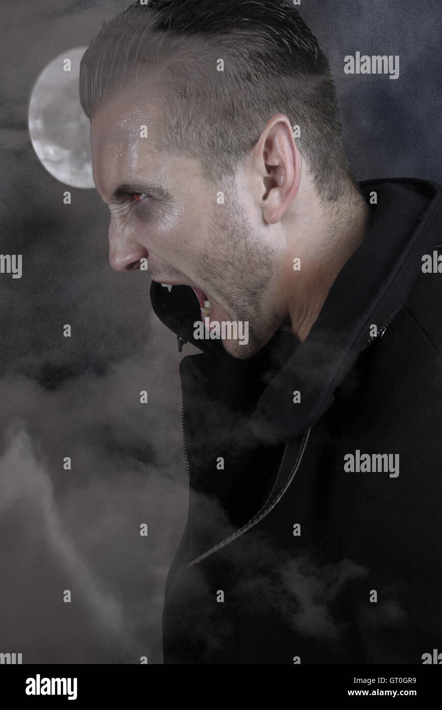 young werewolf screaming on a dark forest Stock Photo - Alamy