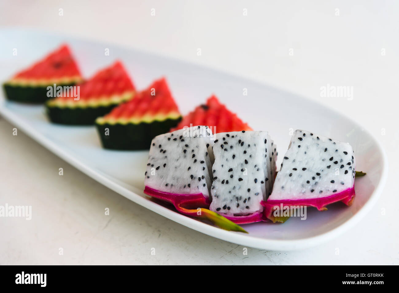 sliced dragon fruit and watermelon on plate Stock Photo - Alamy