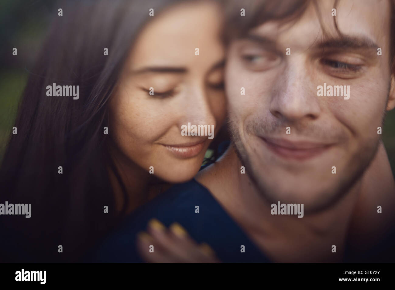 Close-up image of loving romantic couple on holiday having fun and ...