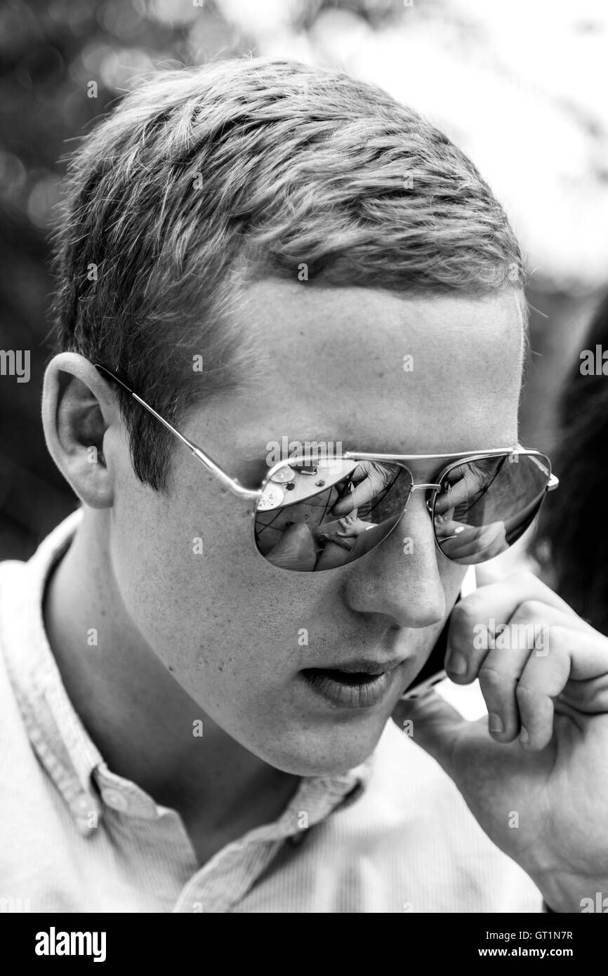 Business on phone outdoors Black and White Stock Photos & Images - Alamy