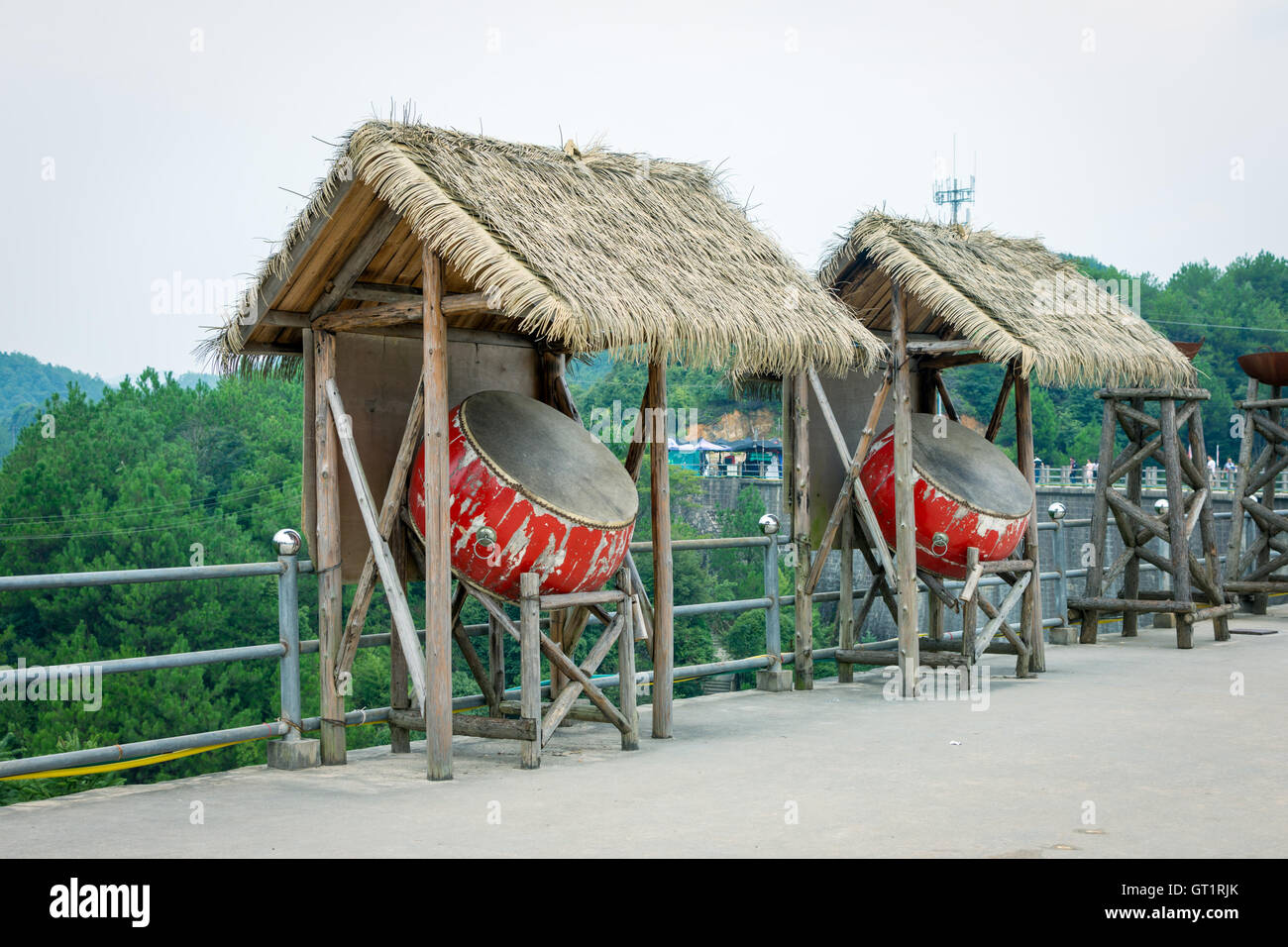 old drum with hay hut Stock Photo - Alamy