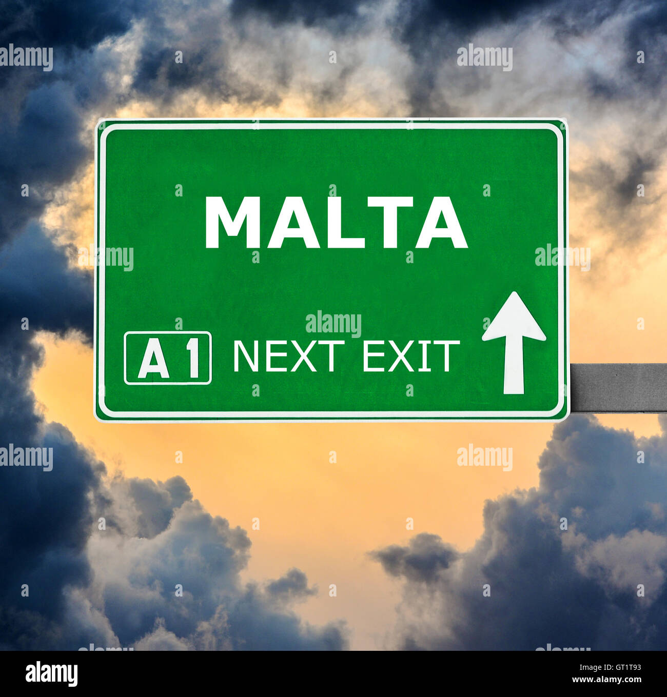 MALTA road sign against clear blue sky Stock Photo - Alamy