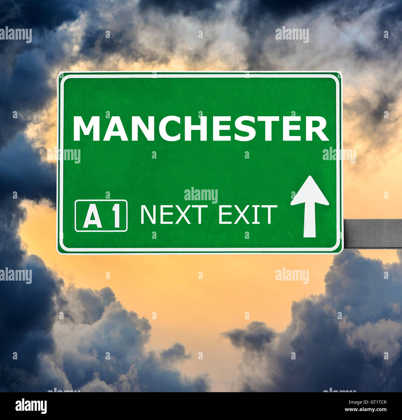 MANCHESTER road sign against clear blue sky Stock Photo - Alamy