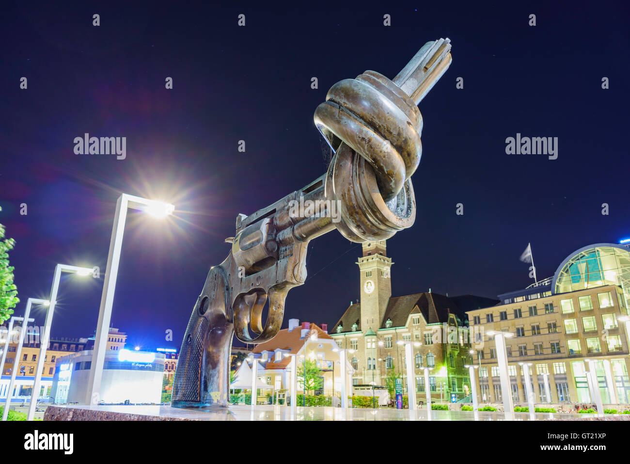 The famous Knotted Gun statue of Malmo at night, Sweden Stock Photo - Alamy
