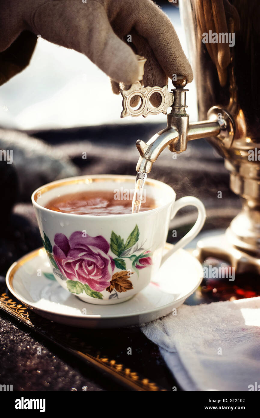 Russian samovar with bagels and jam. Tea party outdoors Stock Photo - Alamy
